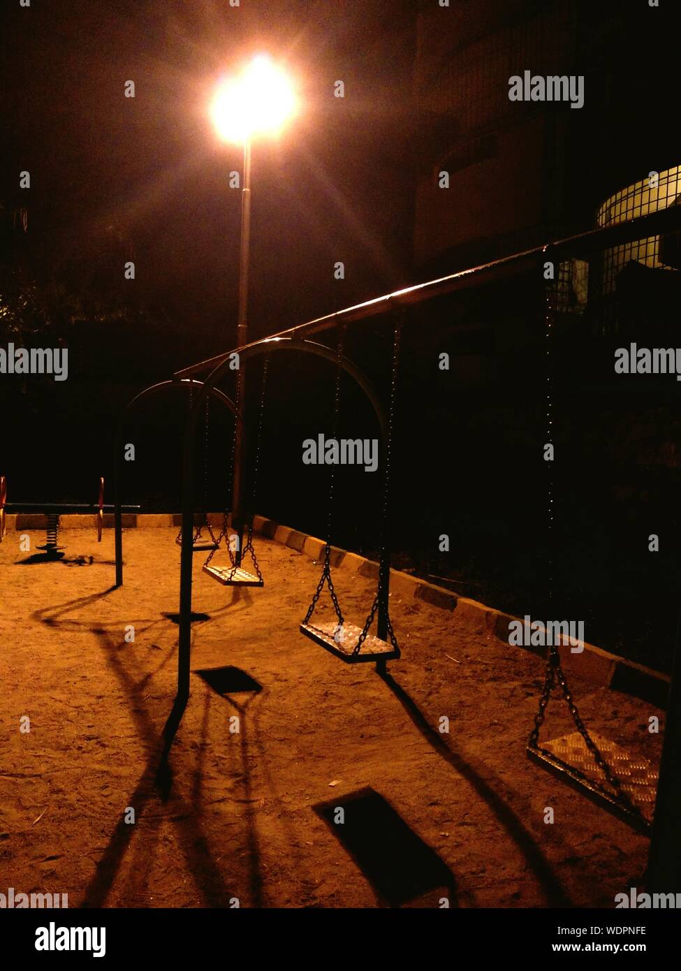 Playground at night hi-res stock photography and images - Alamy