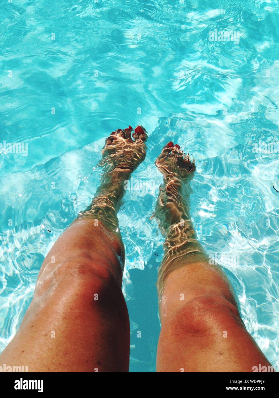 Low angle pool legs High Resolution Stock Photography and Images - Alamy
