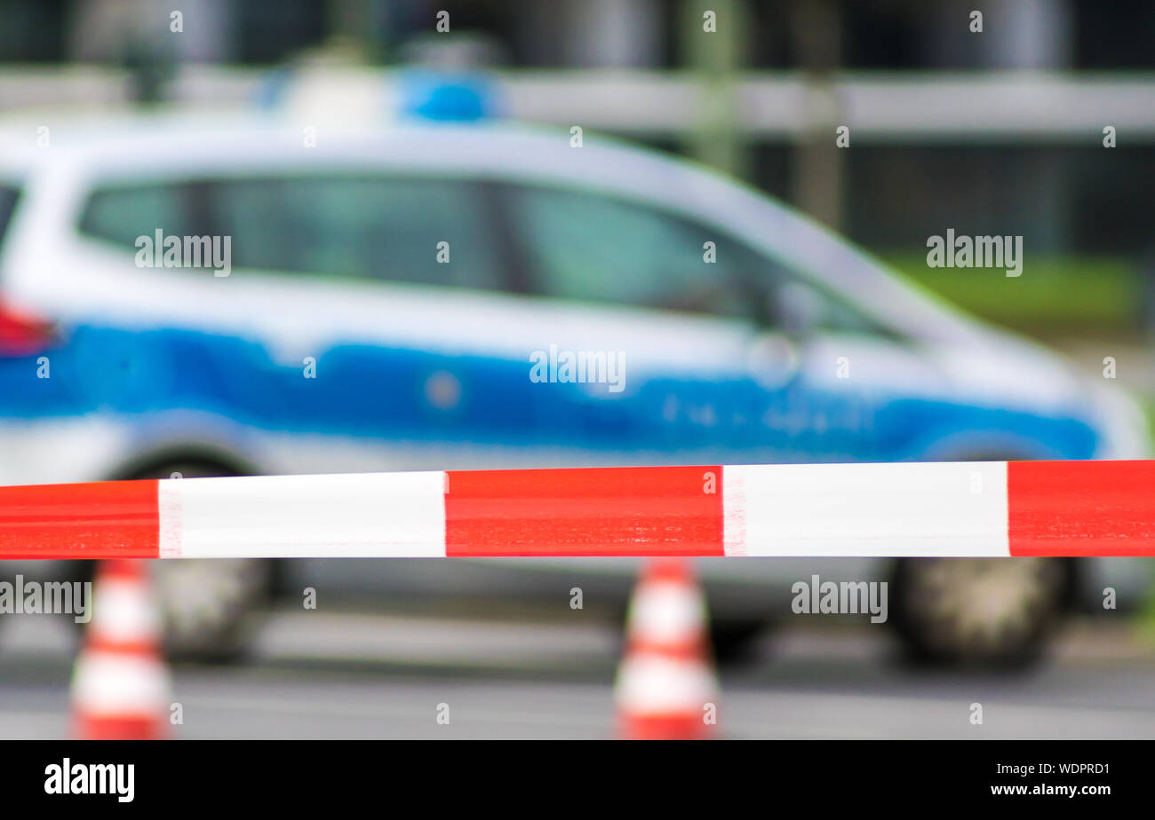 Red and white cordon tape hi-res stock photography and images - Alamy