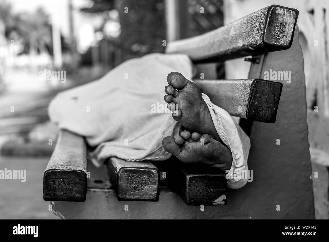 Barefoot homeless man hi-res stock photography and images - Alamy