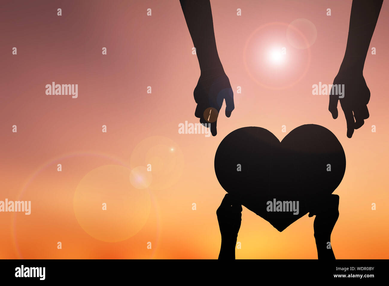 Hand giving heart hi-res stock photography and images - Alamy