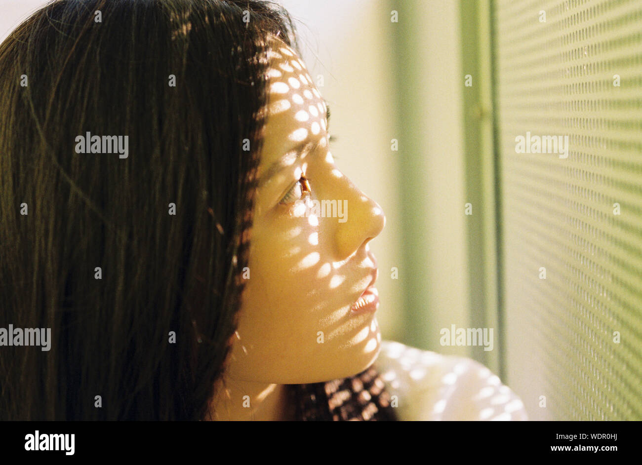 Woman sad window hi-res stock photography and images - Alamy