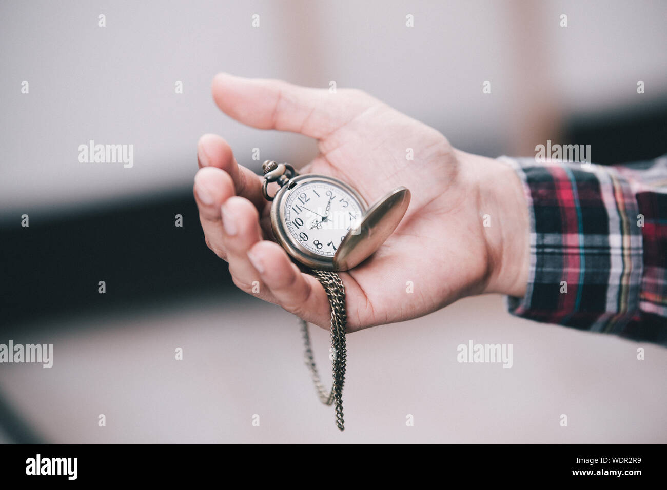 Man with pocket watch hi-res stock photography and images - Alamy