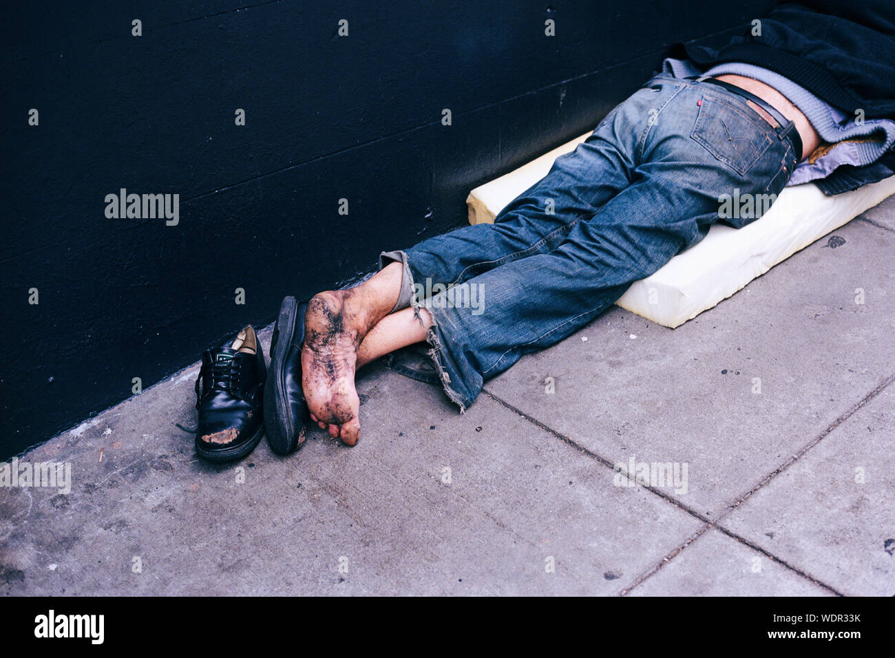Barefoot homeless hi-res stock photography and images - Alamy