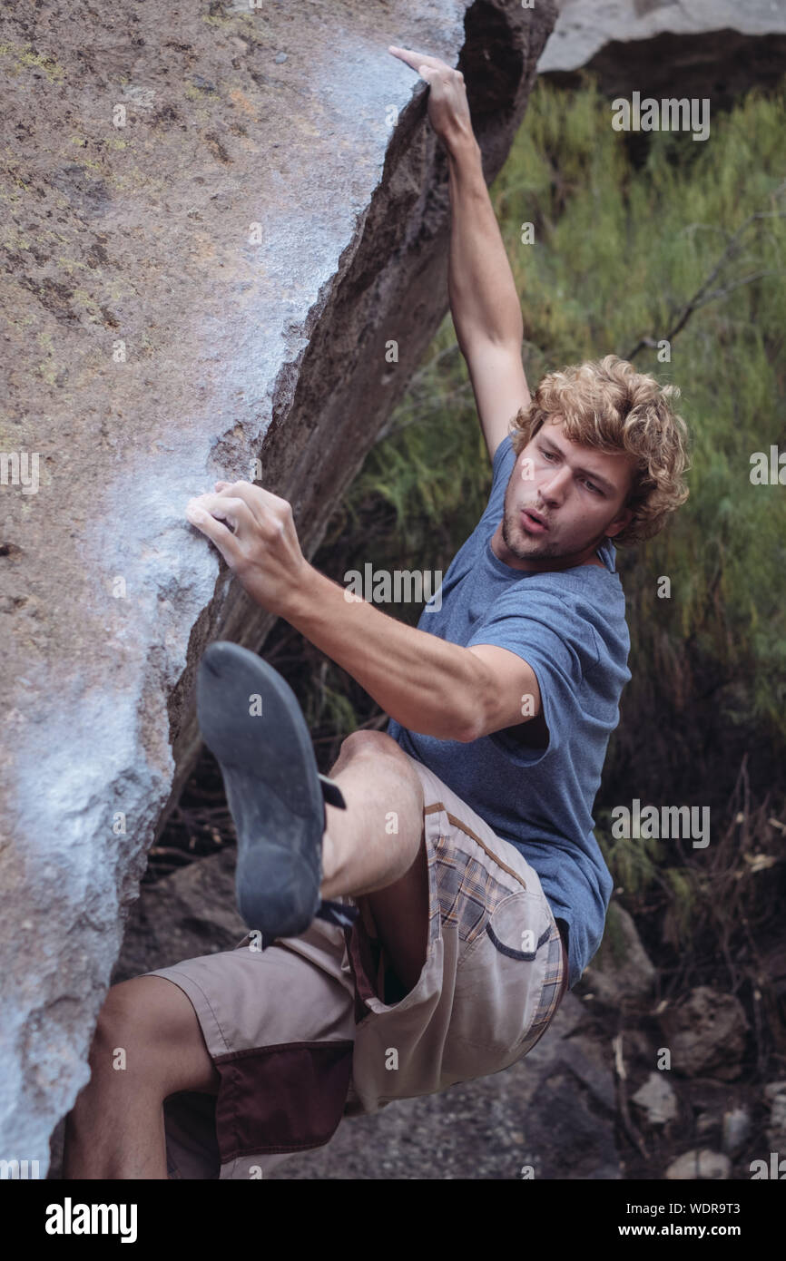 Young Man Bouldering High Resolution Stock Photography and Images - Alamy