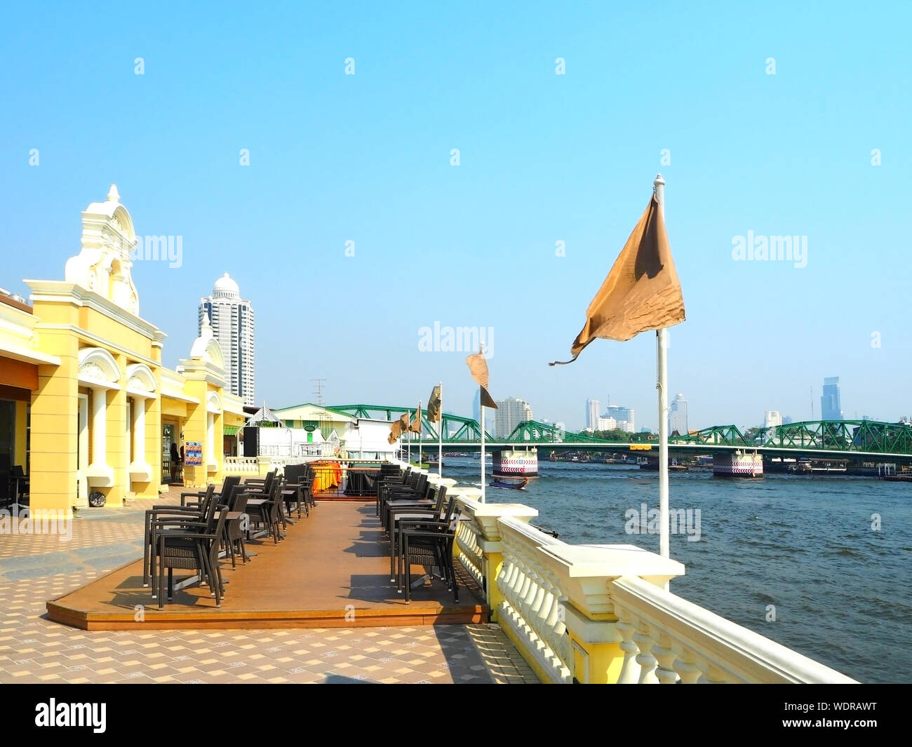 Terrace Along River With Buildings In Background Stock Photo - Alamy