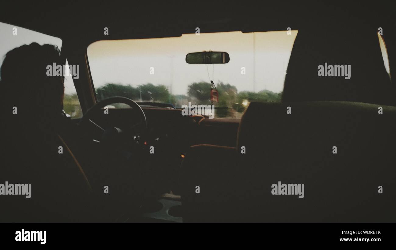 Man driving car interior rear hi-res stock photography and images - Alamy