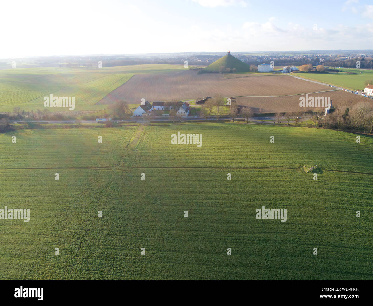 Aerial view of The Lion's Mound with farm land around. The immense ...
