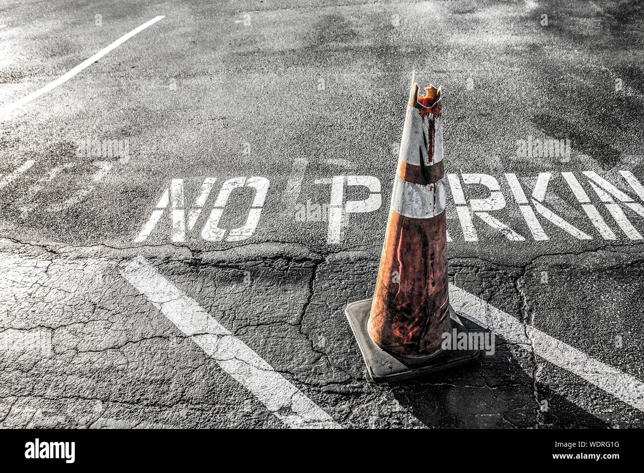 Traffic cone on broken hi-res stock photography and images - Alamy