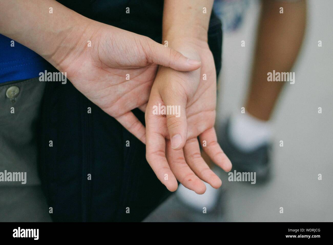 Hands behind his hi-res stock photography and images - Alamy