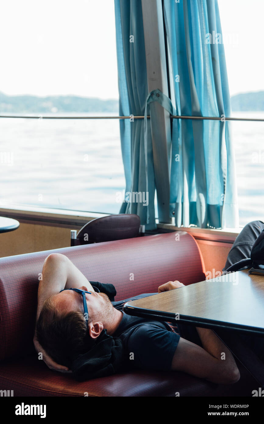 Man sleeping on boat hi-res stock photography and images - Alamy