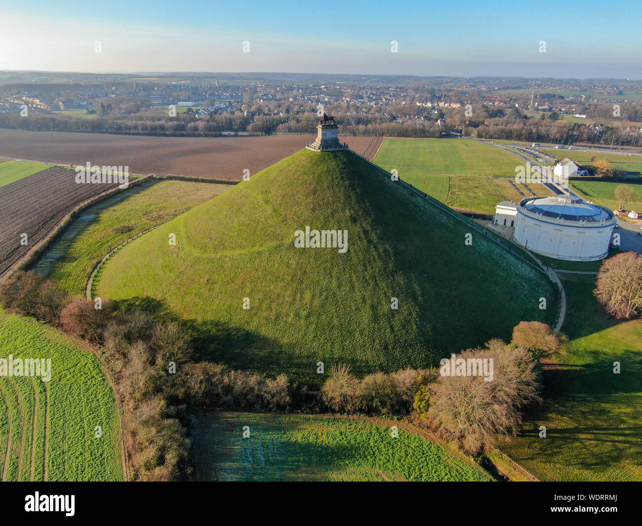 Aerial view of The Lion's Mound with farm land around. The immense ...