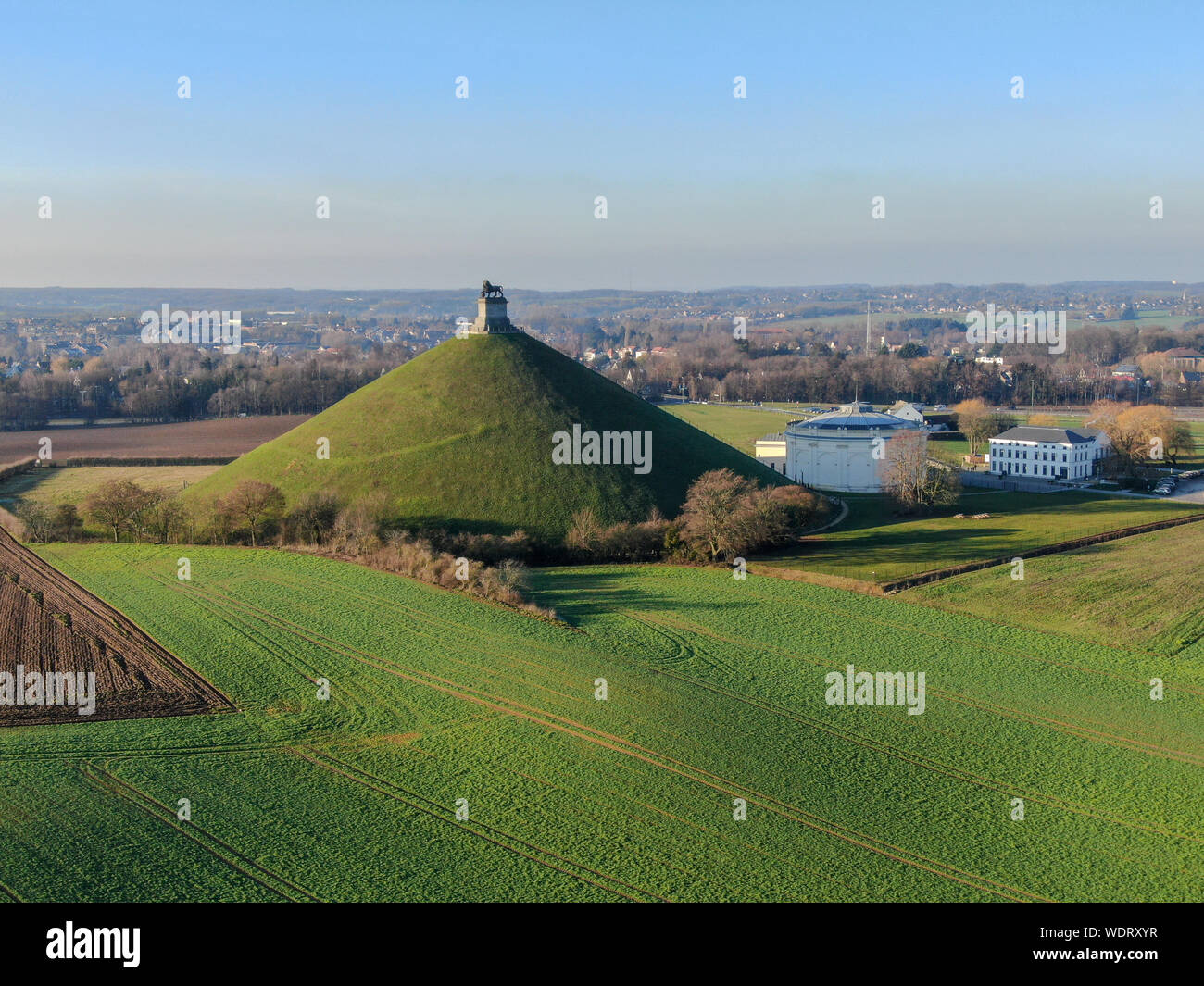 Aerial view of The Lion's Mound with farm land around. The immense ...