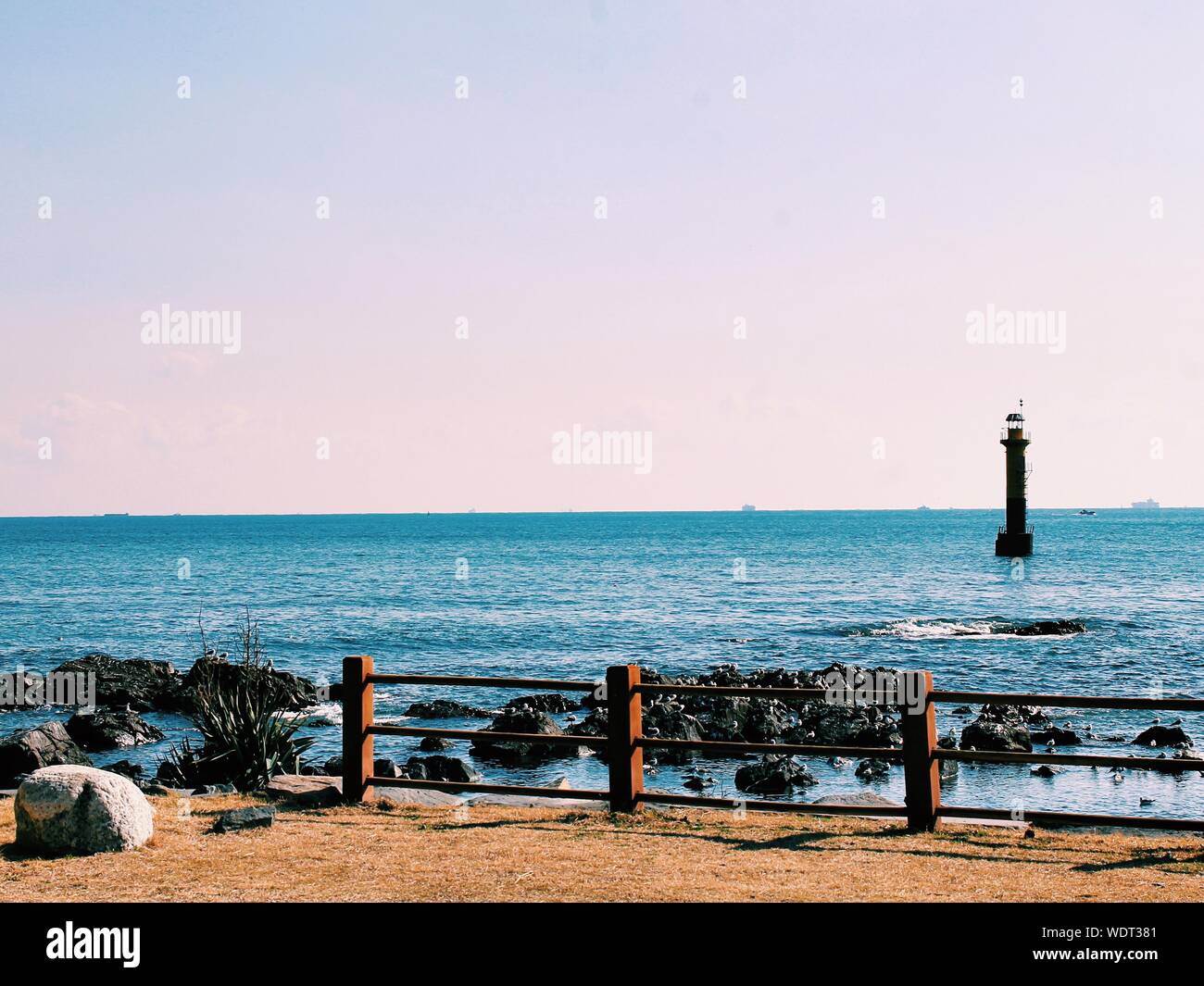 View Of Lighthouse On Beach Stock Photo - Alamy