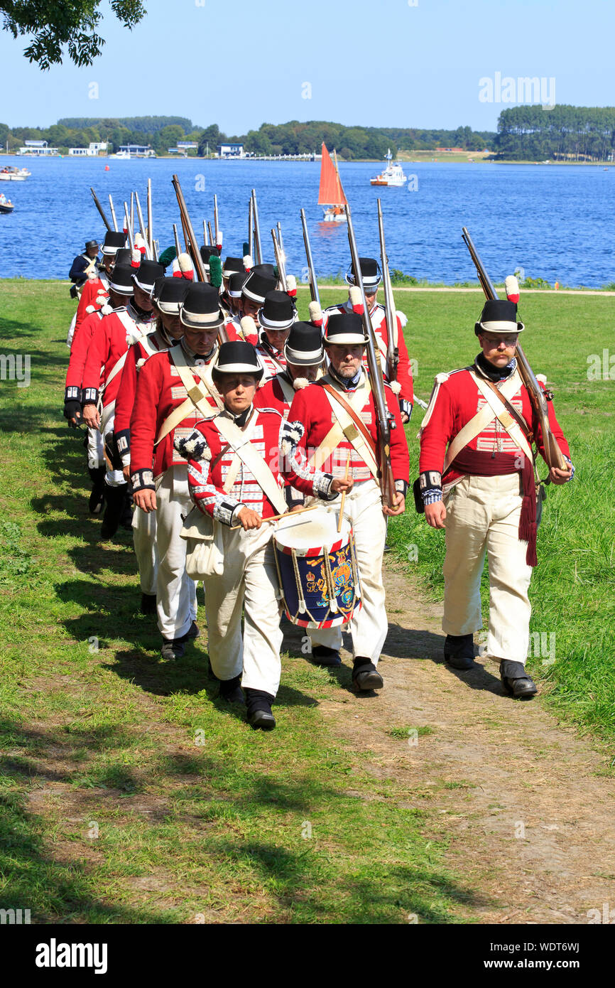 British soldiers marching away from the medieval town of Veere ...