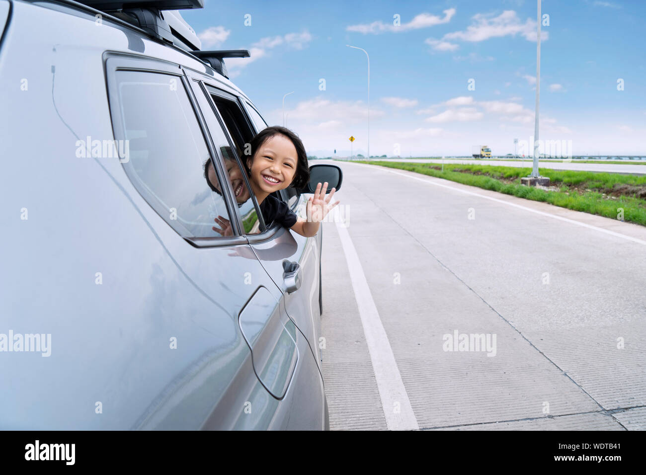 Person waving car hi-res stock photography and images - Alamy