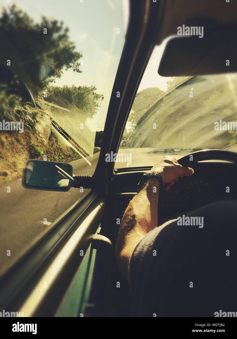 Man driving car sunset interior hi-res stock photography and images - Alamy