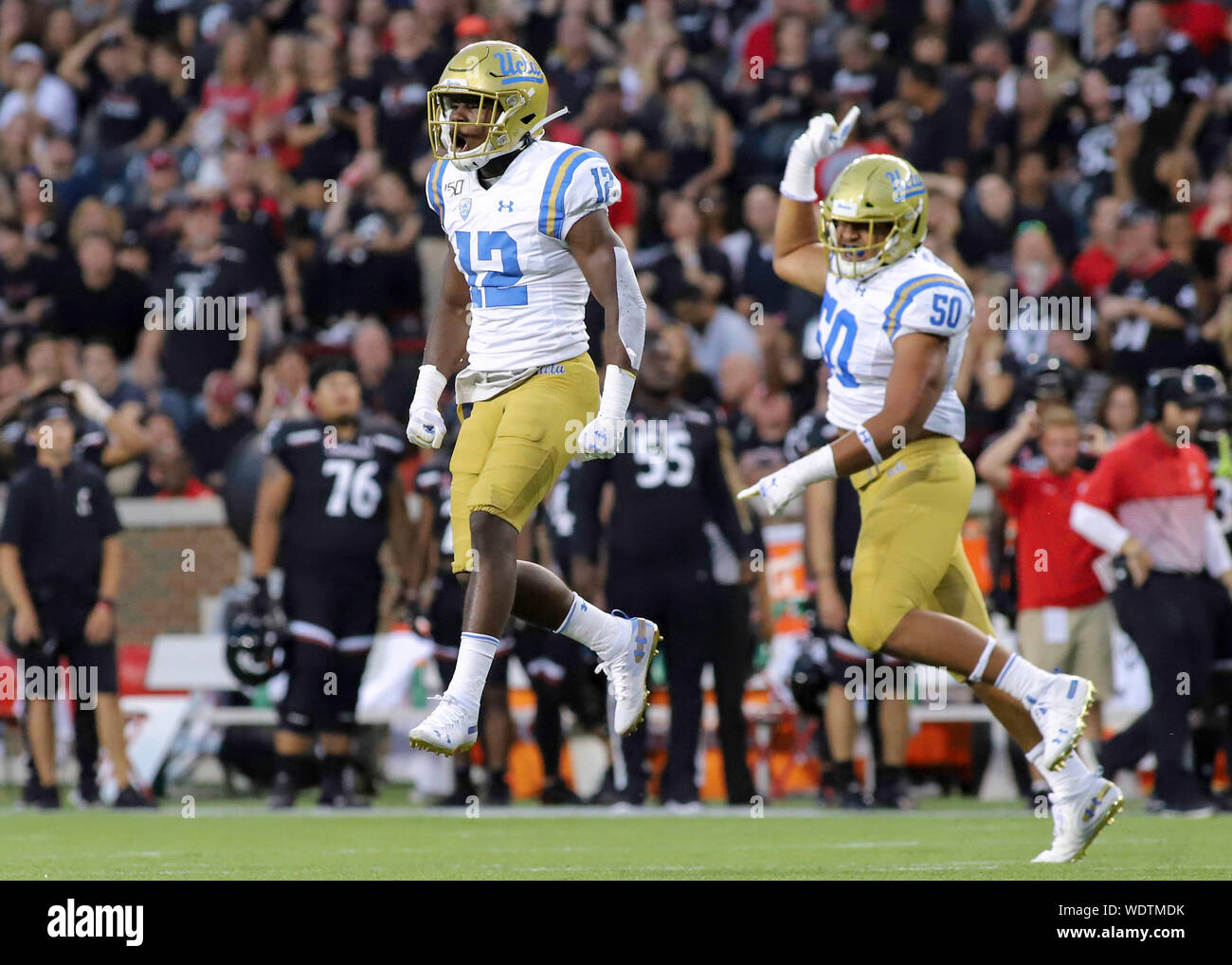 August 29, 2019: UCLA defenders Elijah Gates (12) and Tyler Manoa (50 ...