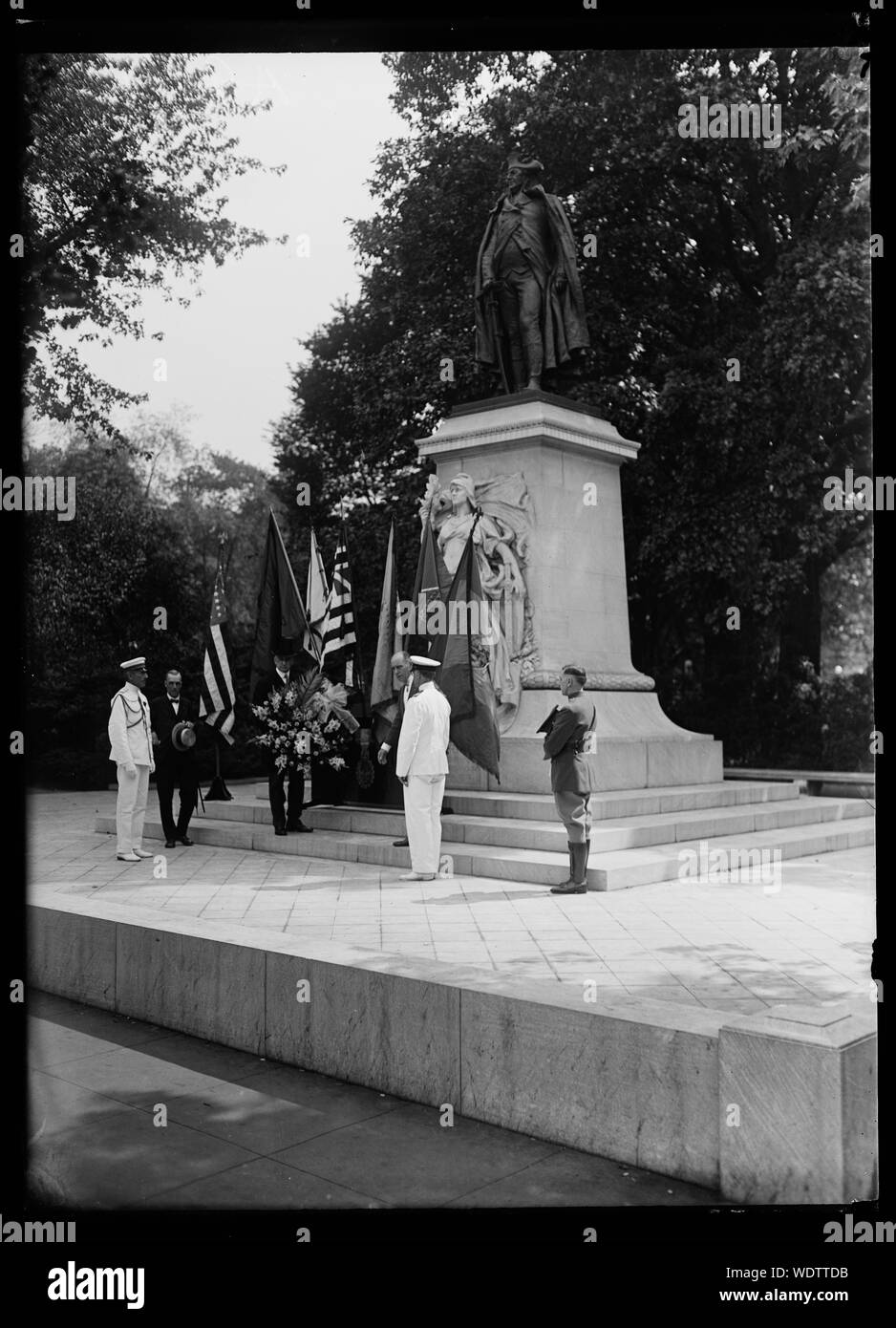 Group placing flowers at statue of Commodore John Barry, Washington, D ...