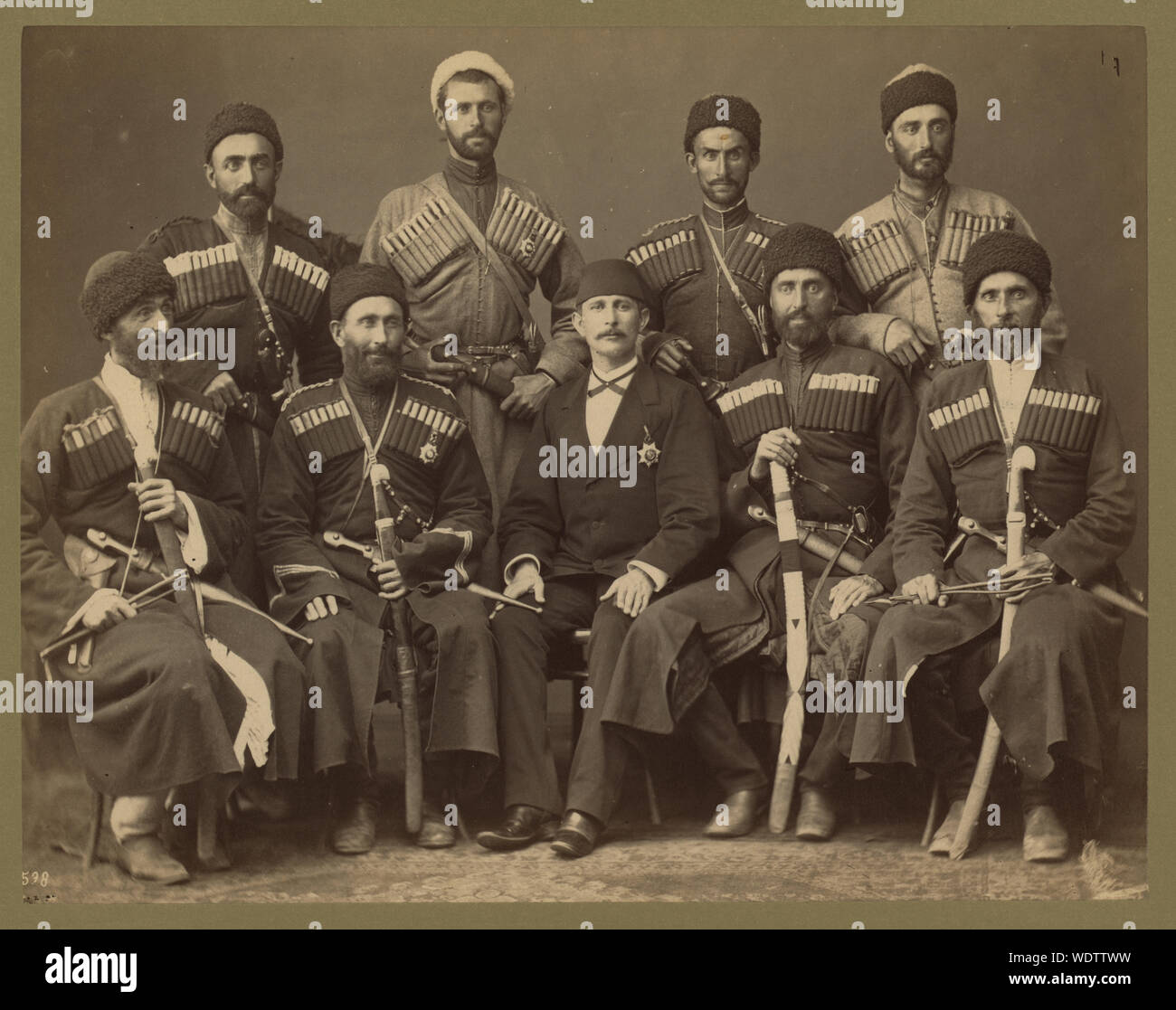 Group portrait of eight Circassian men in uniform, with another man ...