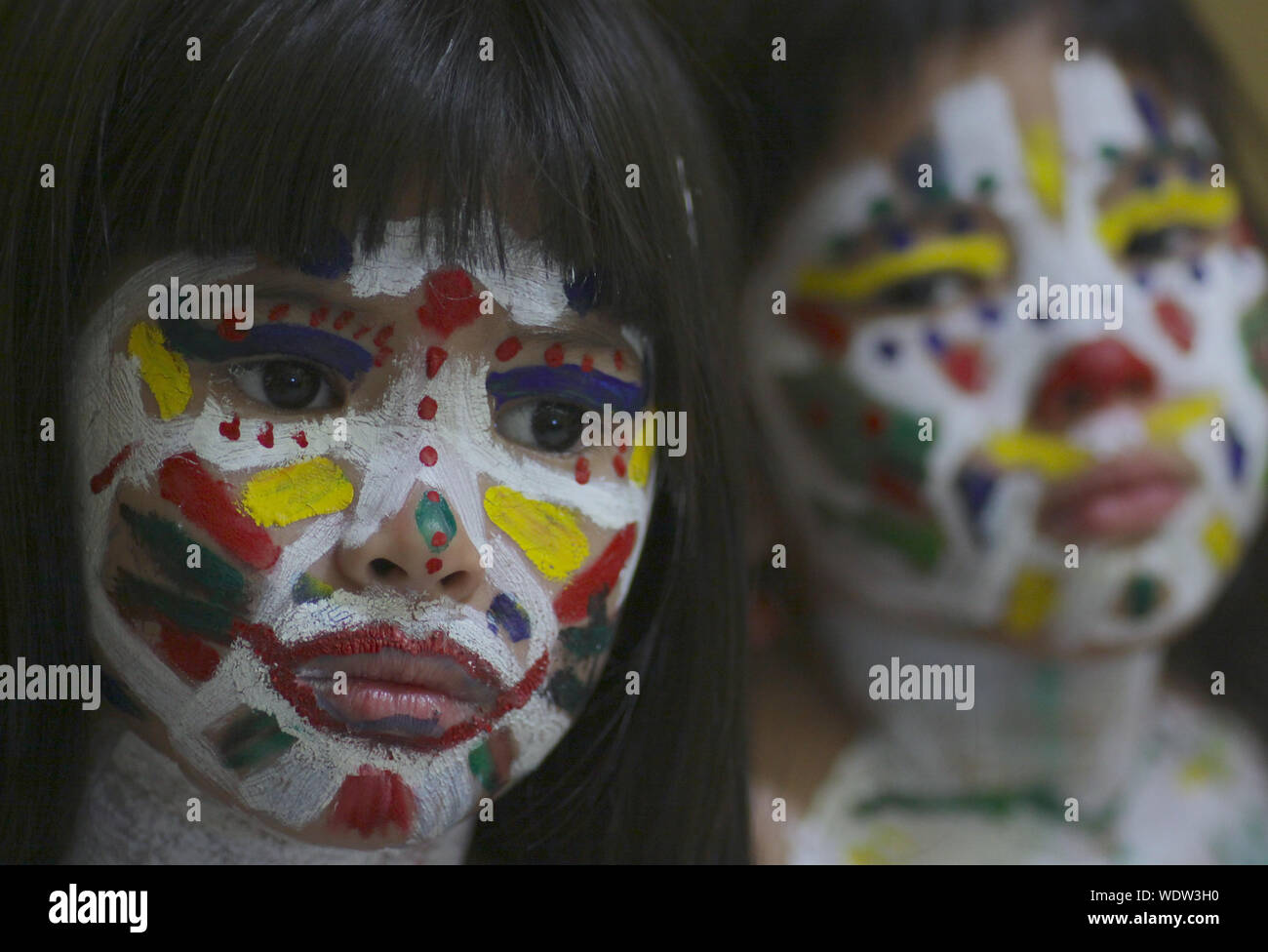 Painted faces painted face hi-res stock photography and images - Alamy