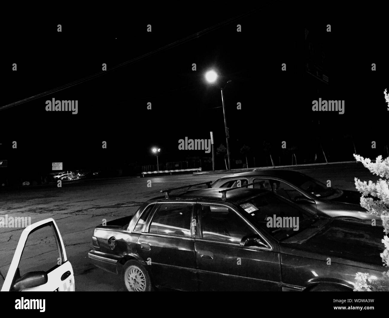 Parked car night Black and White Stock Photos & Images - Alamy