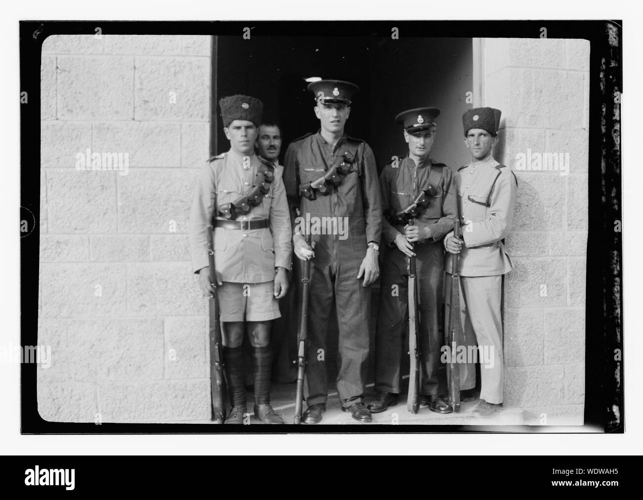 Guards at door of building Abstract/medium: G. Eric and Edith Matson ...