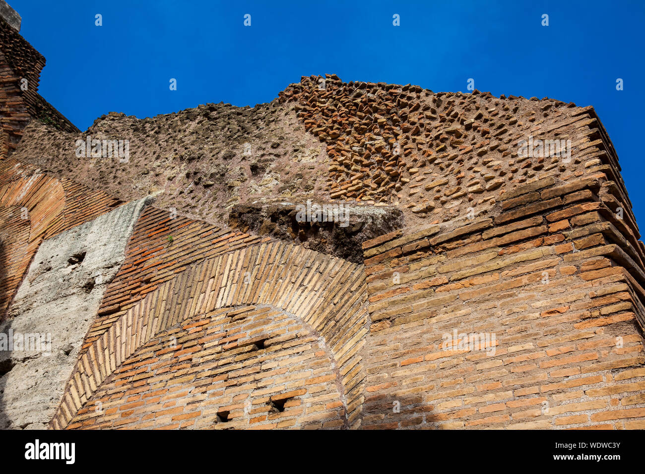 ROME, ITALY - APRIL, 2018: Detail of the walls of the famous Colosseum ...