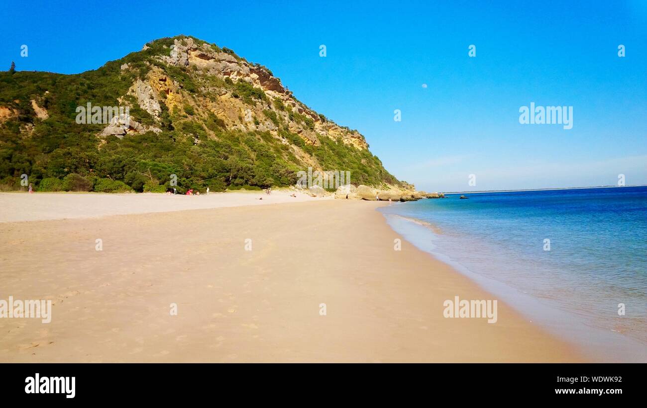 View Of Pure Sandy Beach And Blue Sea Stock Photo - Alamy