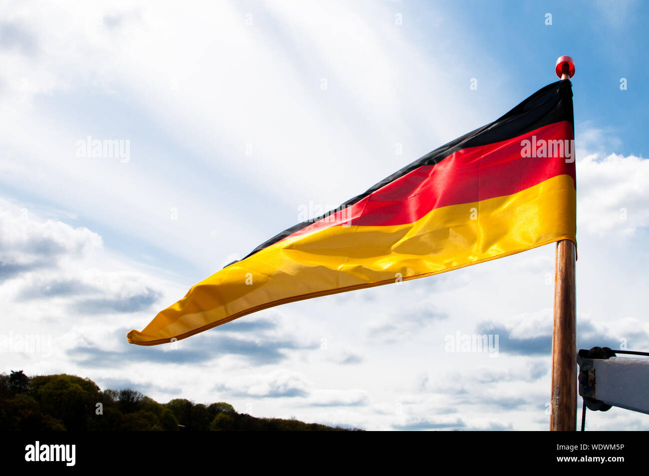 Waving the german flag hi-res stock photography and images - Alamy