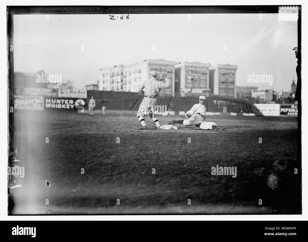 Baseball player sliding into base Cut Out Stock Images & Pictures - Alamy