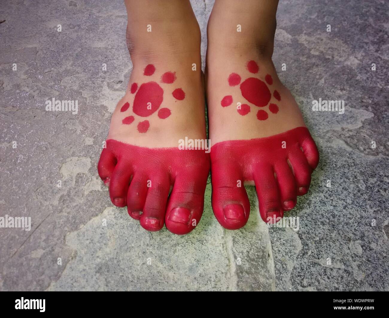 Person in red hi-res stock photography and images - Alamy