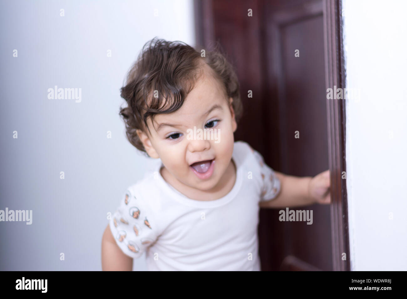 Standing by open door hi-res stock photography and images - Alamy