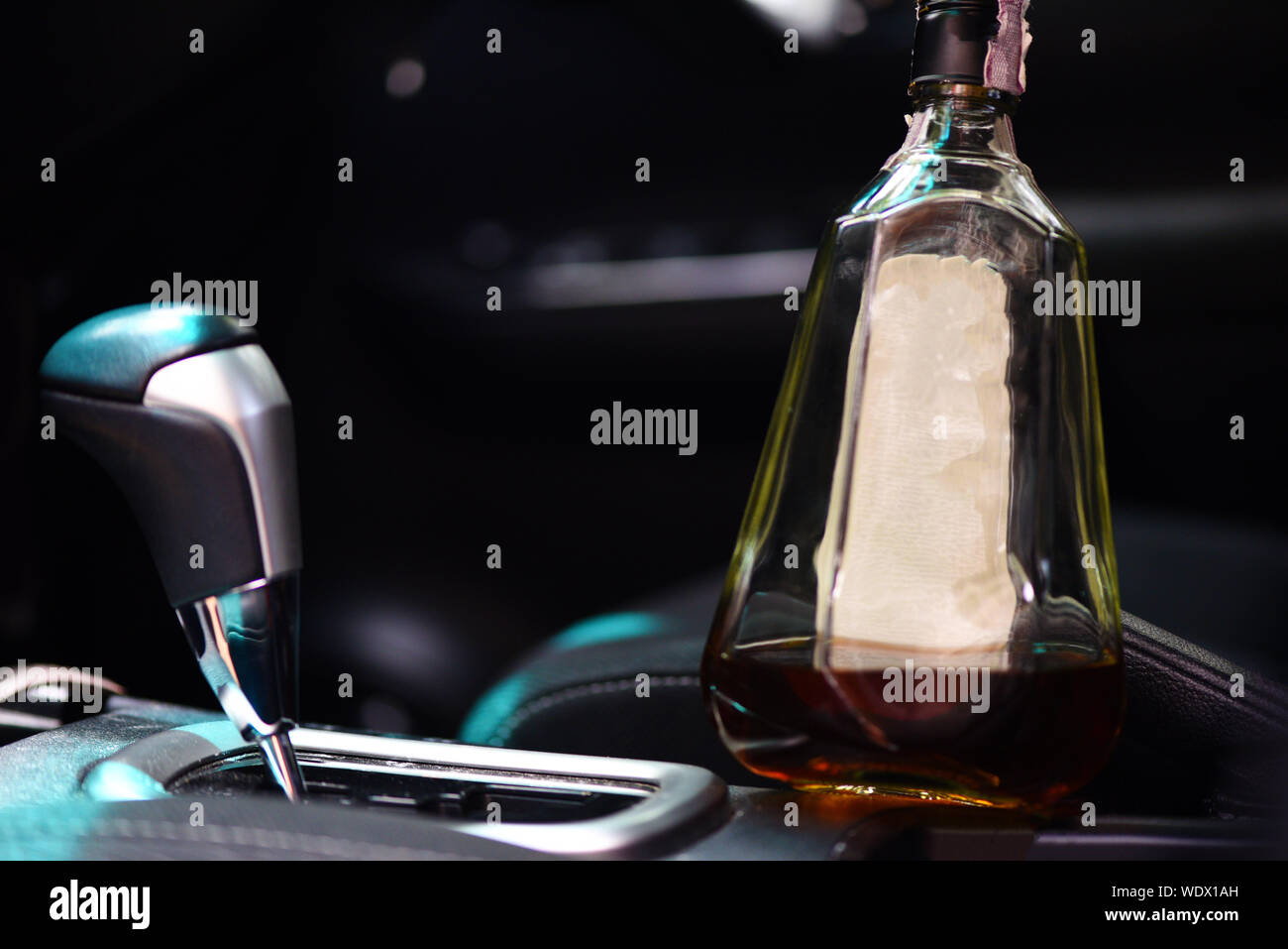 drunk driver concept / alcohol bottle in seats and drive drink alcohol ...