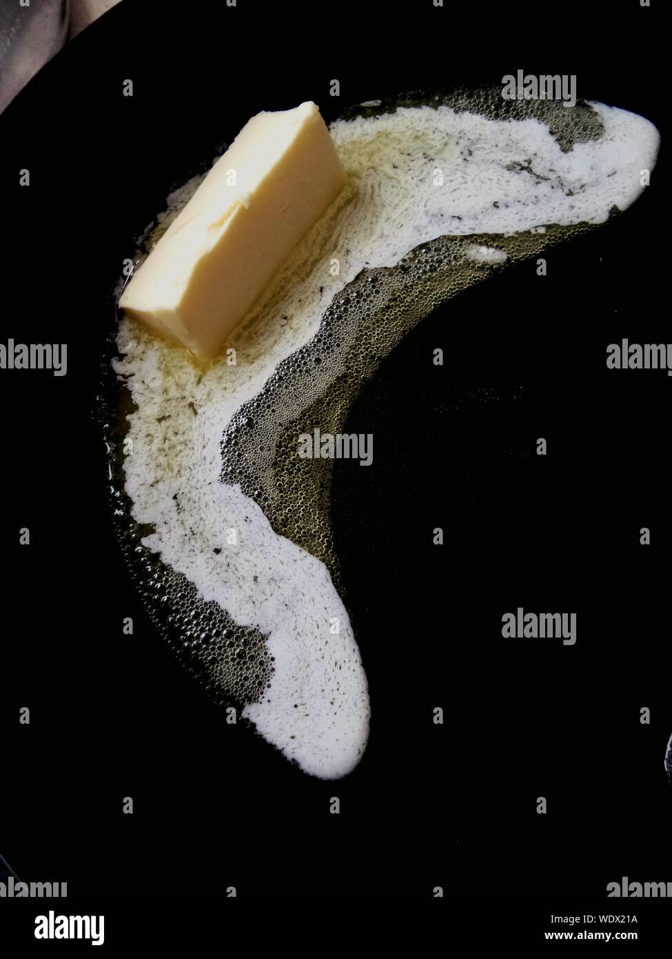 Butter pan melting hi-res stock photography and images - Alamy