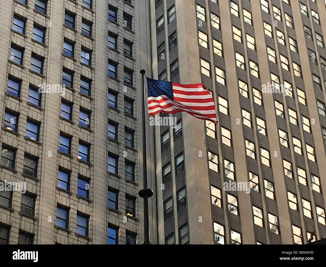 American flag office buildings hi-res stock photography and images - Alamy
