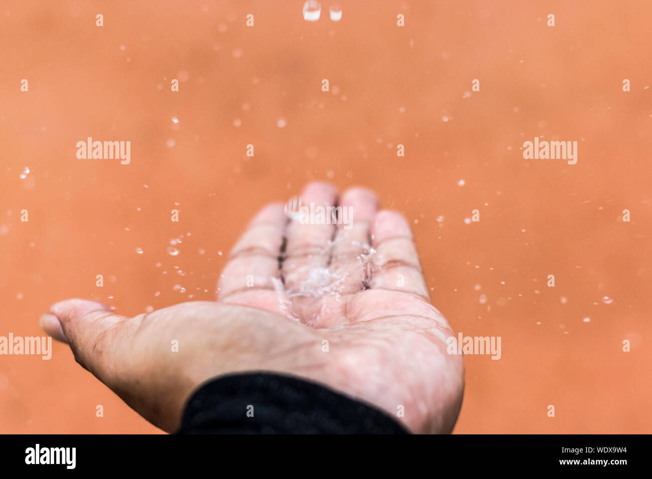 Human hand splashing water hi-res stock photography and images - Alamy
