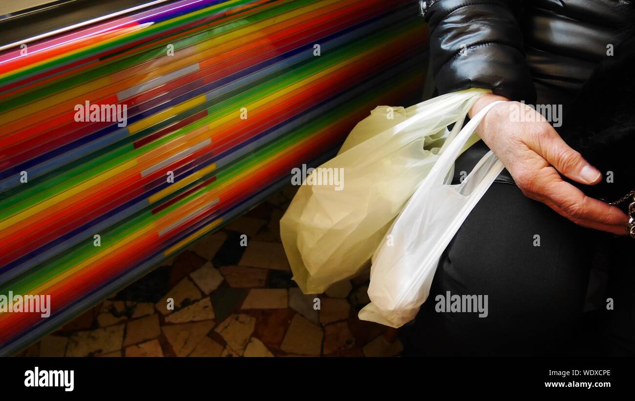 Holding plastic bags hand hi-res stock photography and images - Alamy