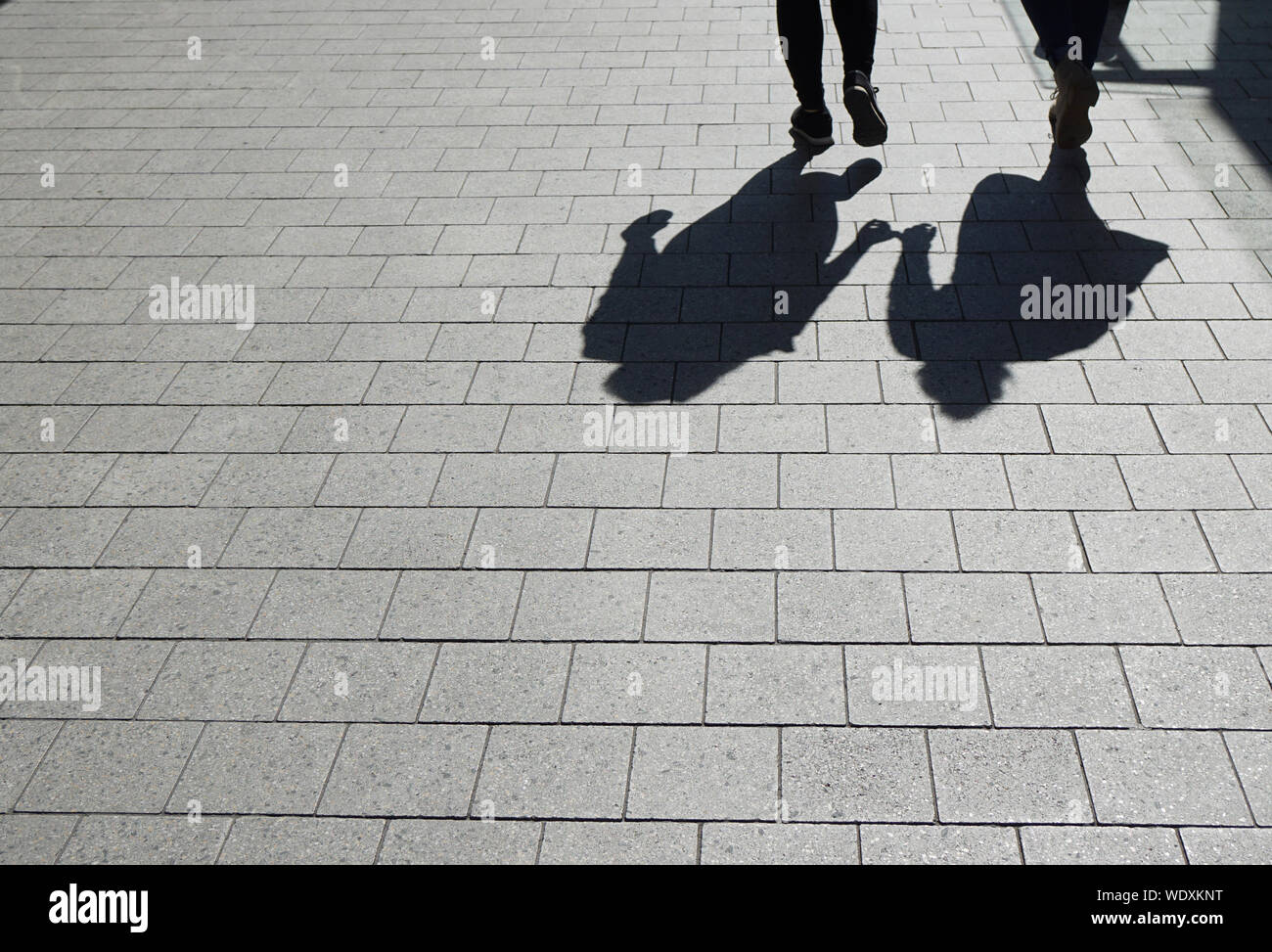 Side view shadow walking hi-res stock photography and images - Alamy