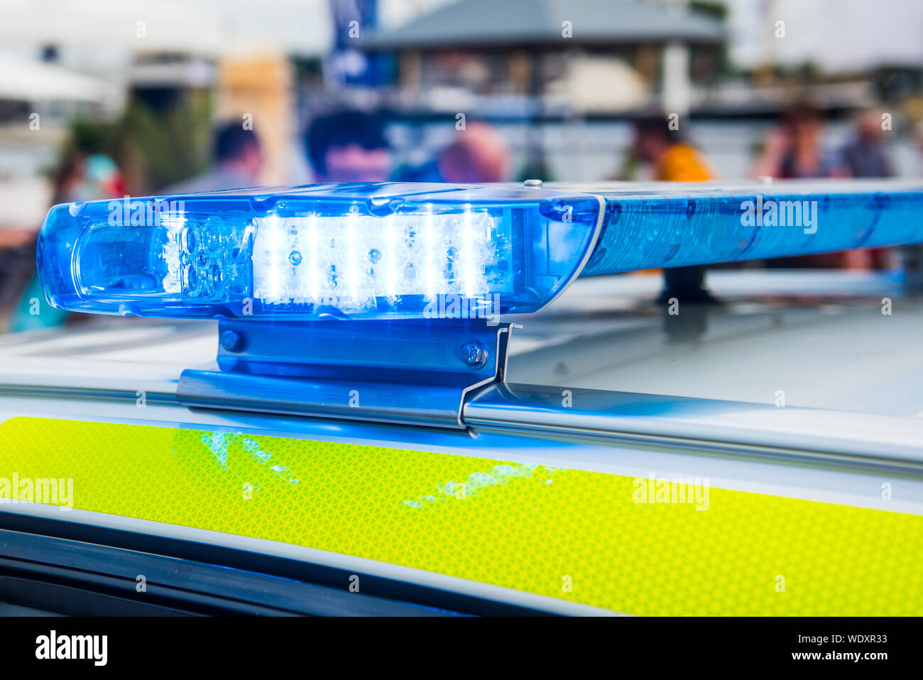 Yellow and blue police car hi-res stock photography and images - Alamy