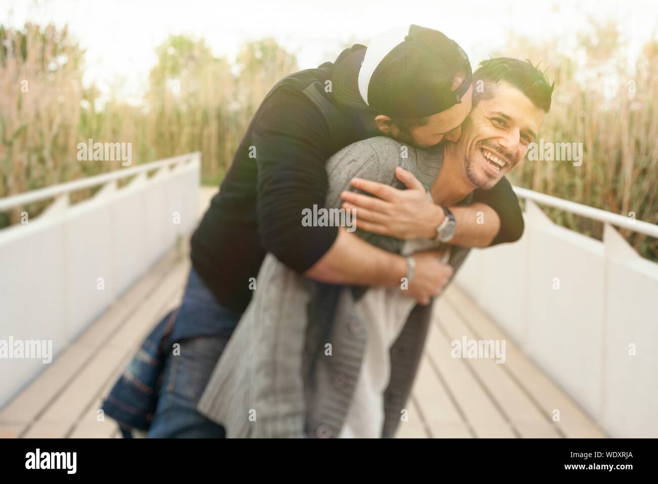 Shoulder riding hi-res stock photography and images - Alamy