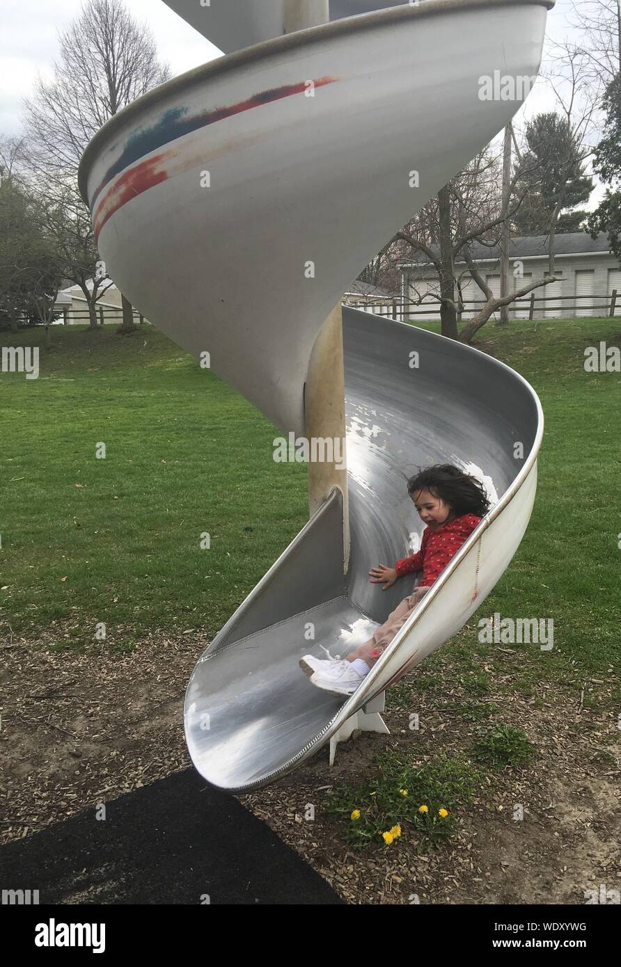 Slide motion sliding playground hi-res stock photography and images - Alamy