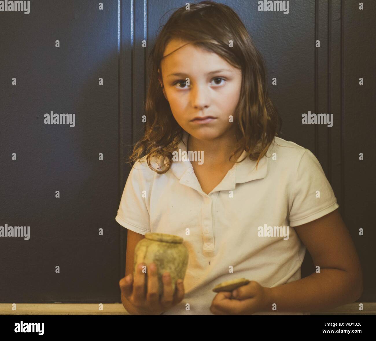 Girl sitting container hi-res stock photography and images - Alamy