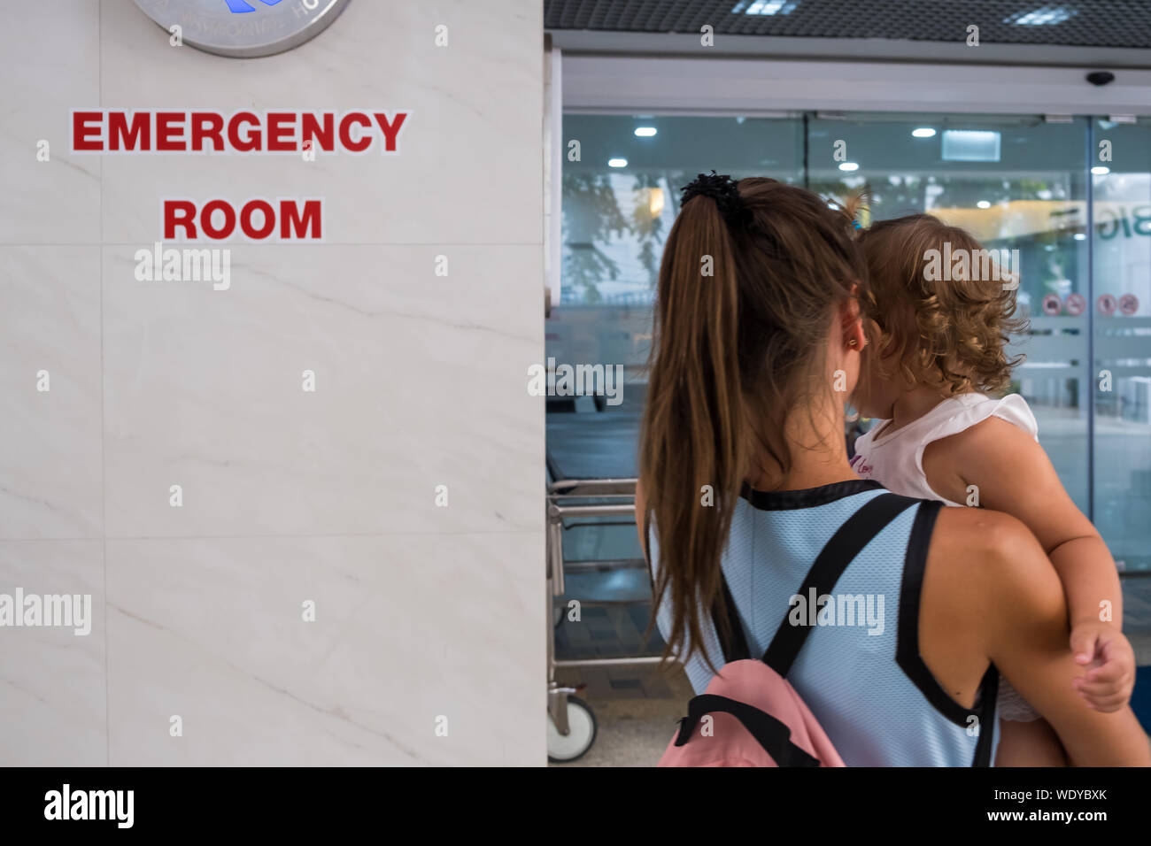 Mom and child come in in the emergency room at the hospital in Pattaya ...