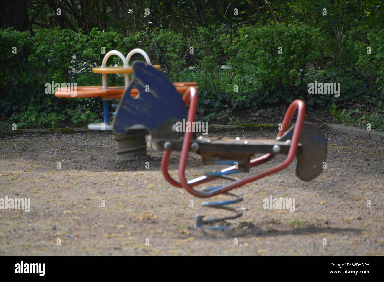 Playground with rides hi-res stock photography and images - Alamy