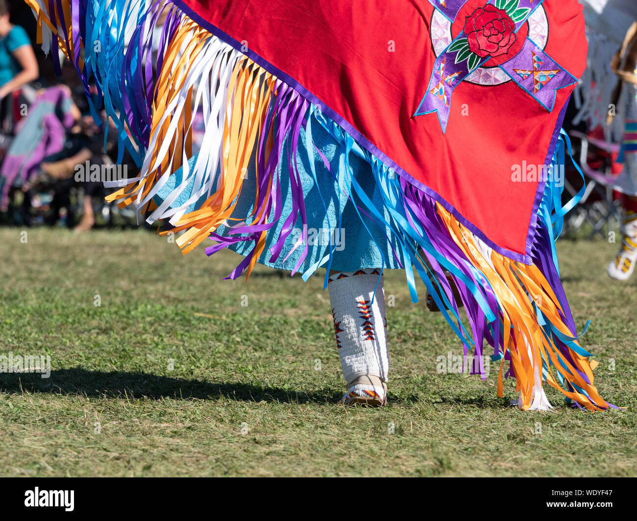 Ribbon fringed shawl with rose motif worn by a Native American woman ...