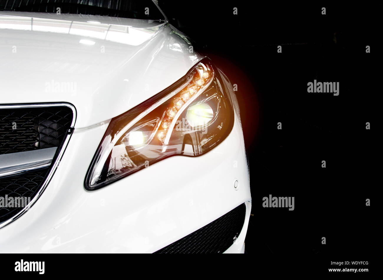 Details of modern car headlights.The system of the car headlights is ...