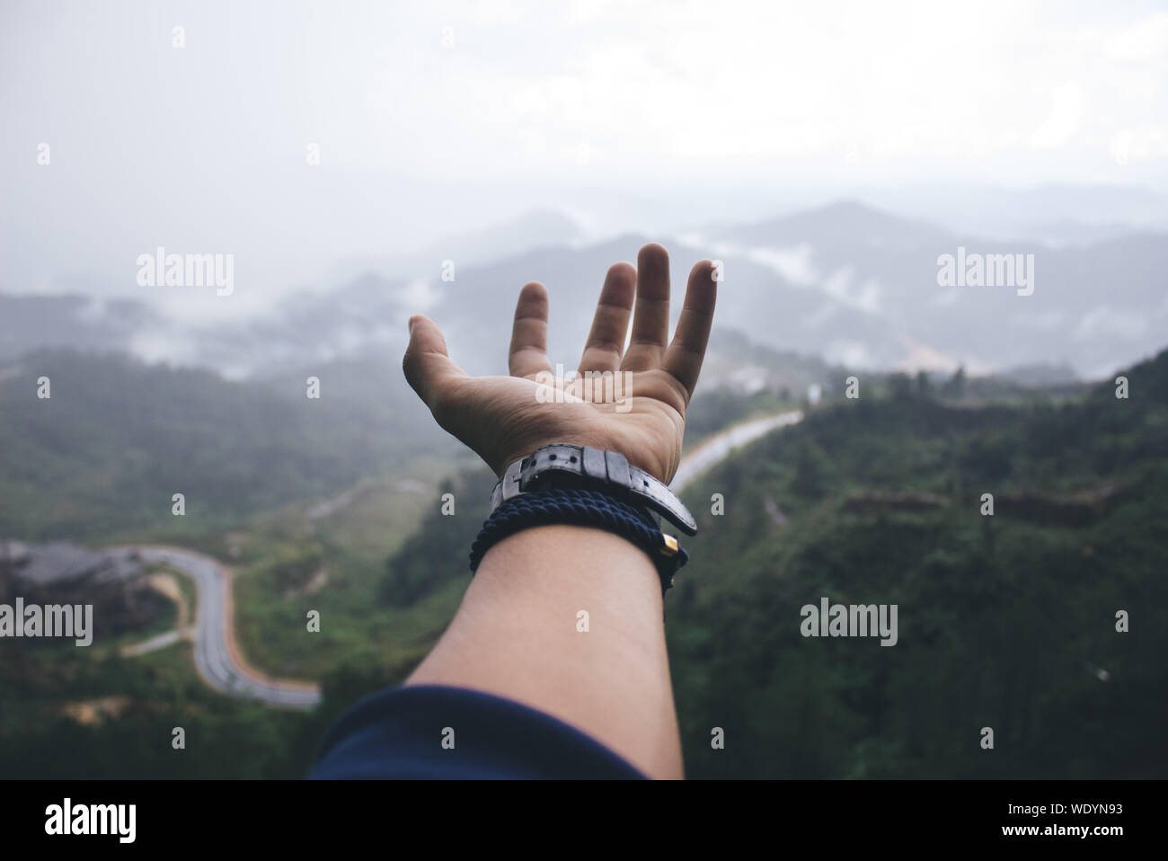 Helping hand mountain hi-res stock photography and images - Alamy