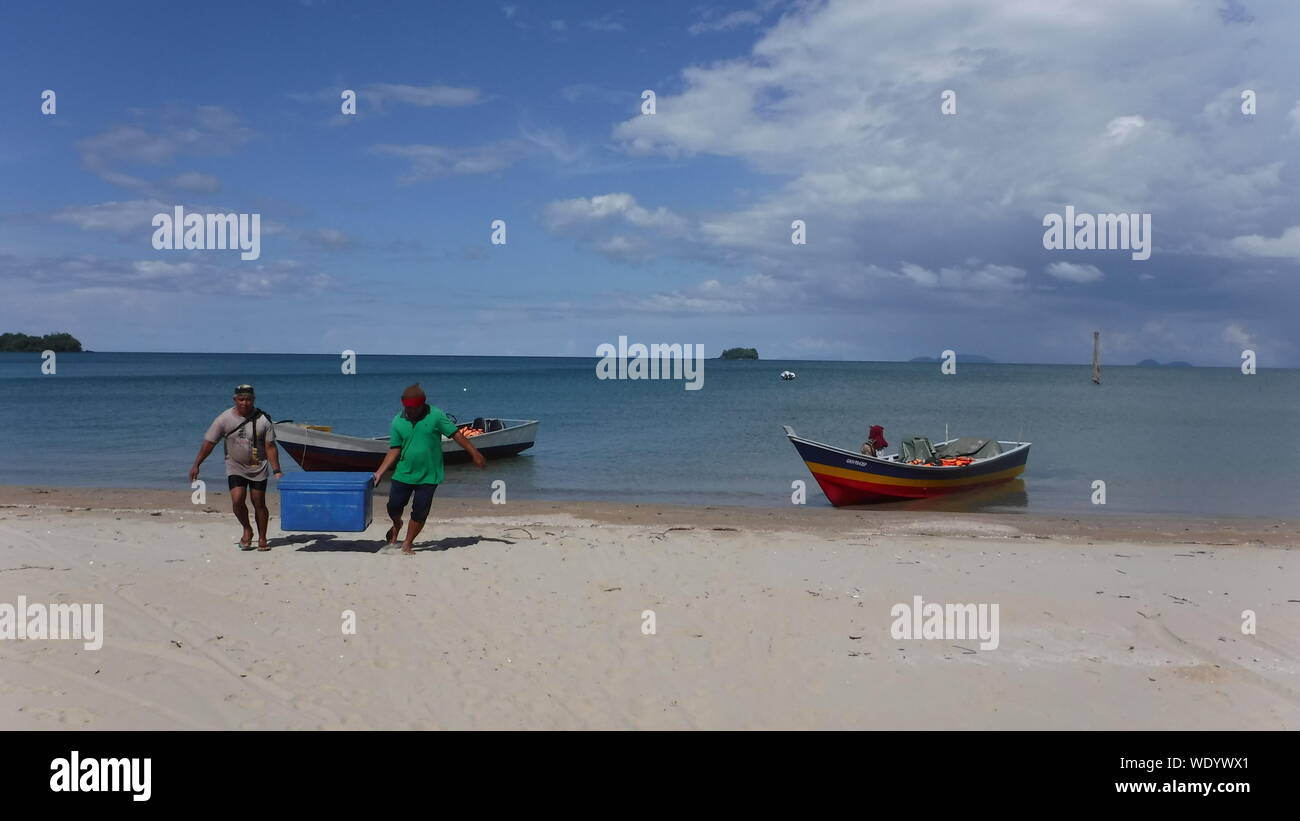Working beach hi-res stock photography and images - Alamy