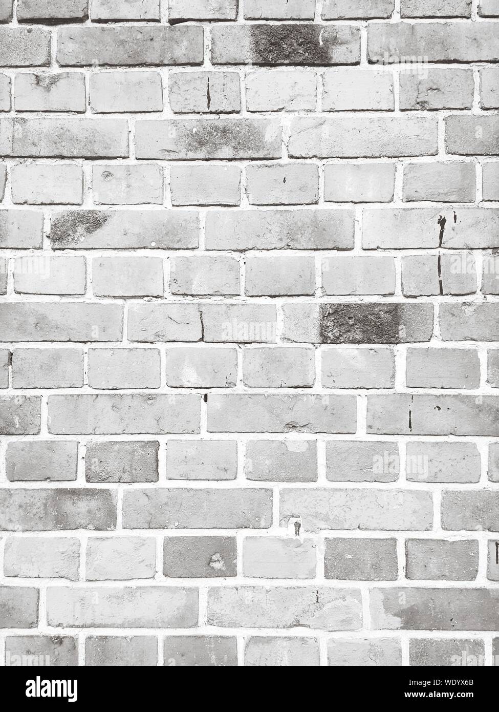 Gray brick wall hi-res stock photography and images - Alamy